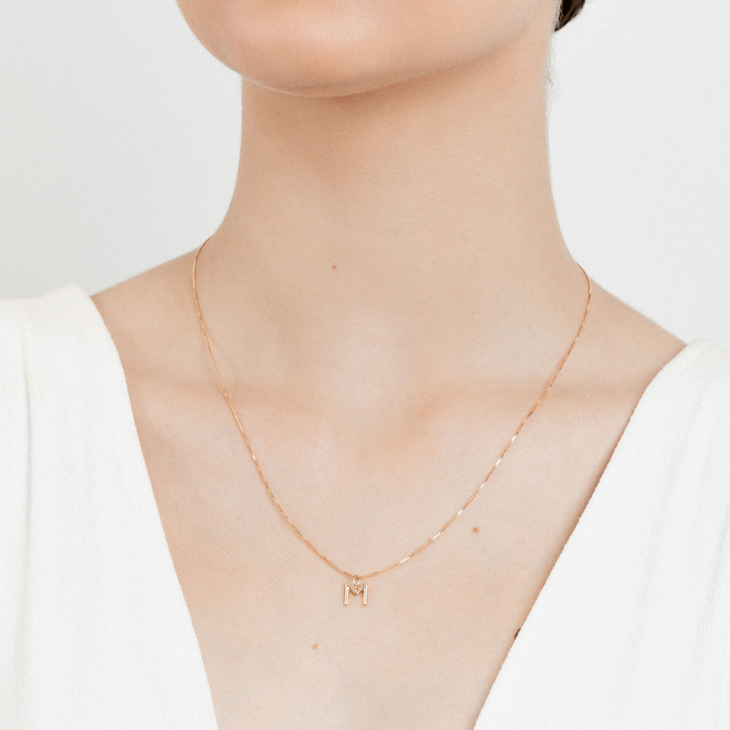 Pingente Letra M em Ouro Amarelo 18k | MONTE CARLO